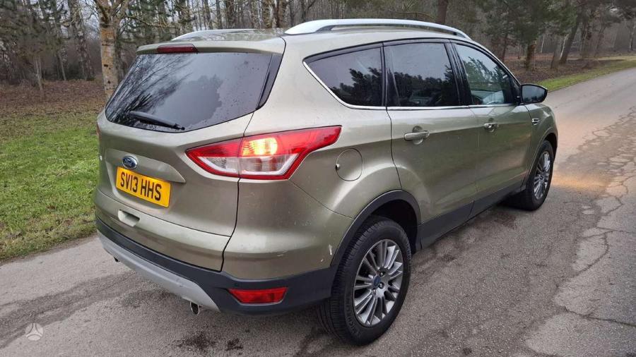 Green Ford Kuga 2013 in Siauliai, with an engine capacity of 2.00 L and mileage of 123 thousand km for 2998 €, photo 6 on AUTOMOTO.COM.LV