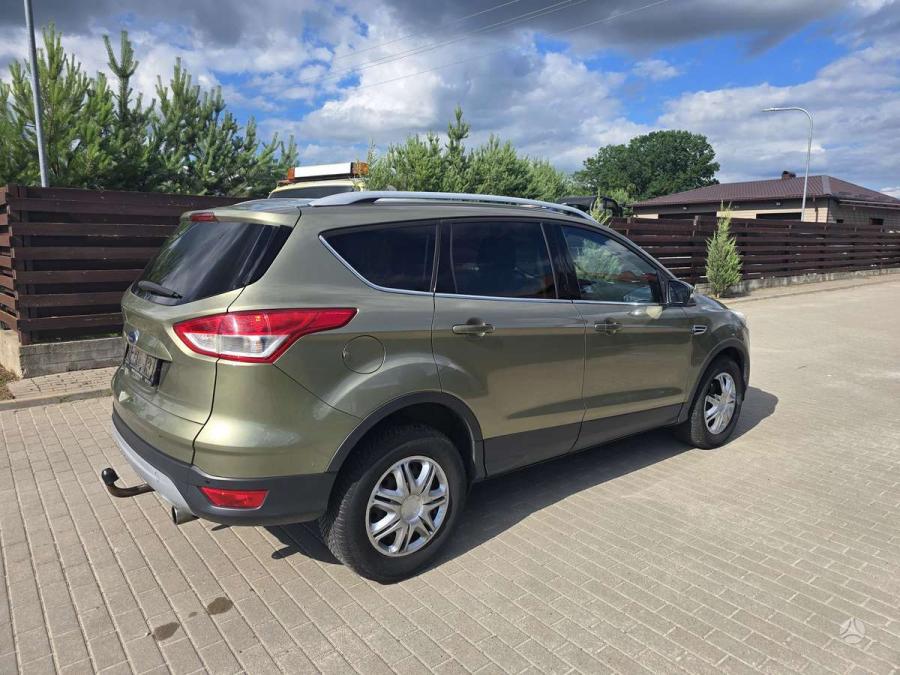 Green Ford Kuga 2013 in Kaunas, with an engine capacity of 2.00 L and mileage of 350 thousand km for 6950 €, photo 5 on AUTOMOTO.COM.LV