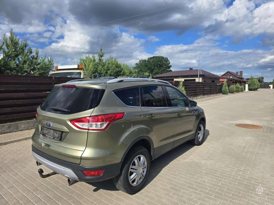 Green Ford Kuga 2013 in Kaunas, with an engine capacity of 2.00 L and mileage of 350 thousand km for 6950 €, photo 6 on AUTOMOTO.COM.LV