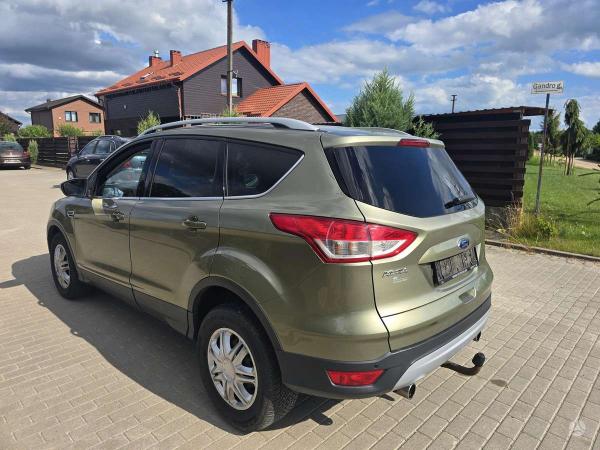 Green Ford Kuga 2013 in Kaunas, with an engine capacity of 2.00 L and mileage of 350 thousand km for 6950 €, photo 7 on AUTOMOTO.COM.LV