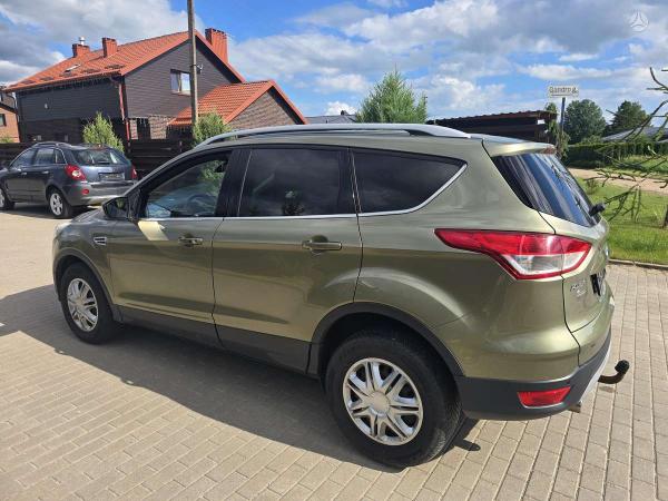 Green Ford Kuga 2013 in Kaunas, with an engine capacity of 2.00 L and mileage of 350 thousand km for 6950 €, photo 8 on AUTOMOTO.COM.LV