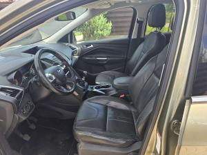 Green Ford Kuga 2013 in Kaunas, with an engine capacity of 2.00 L and mileage of 350 thousand km for 6950 €, photo 13 on AUTOMOTO.COM.LV