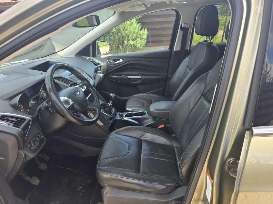 Green Ford Kuga 2013 in Kaunas, with an engine capacity of 2.00 L and mileage of 350 thousand km for 6950 €, photo 13 on AUTOMOTO.COM.LV