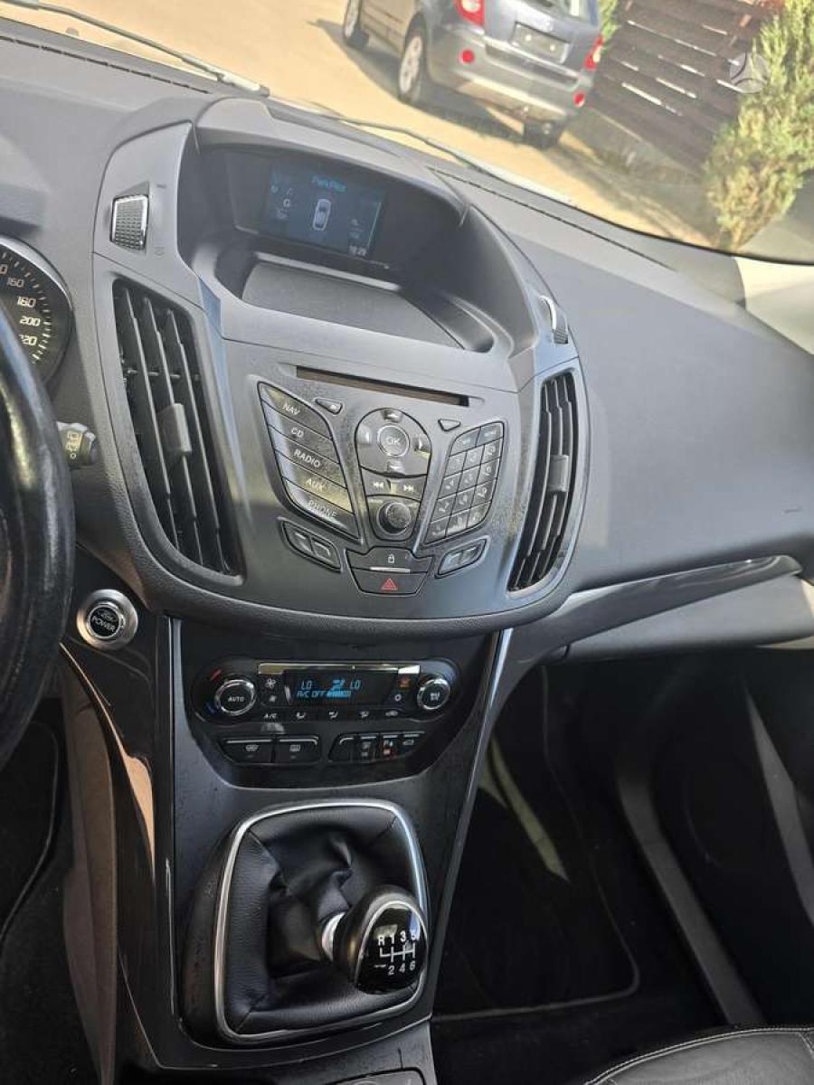 Green Ford Kuga 2013 in Kaunas, with an engine capacity of 2.00 L and mileage of 350 thousand km for 6950 €, photo 15 on AUTOMOTO.COM.LV