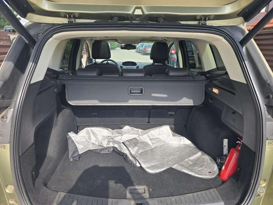 Green Ford Kuga 2013 in Kaunas, with an engine capacity of 2.00 L and mileage of 350 thousand km for 6950 €, photo 19 on AUTOMOTO.COM.LV