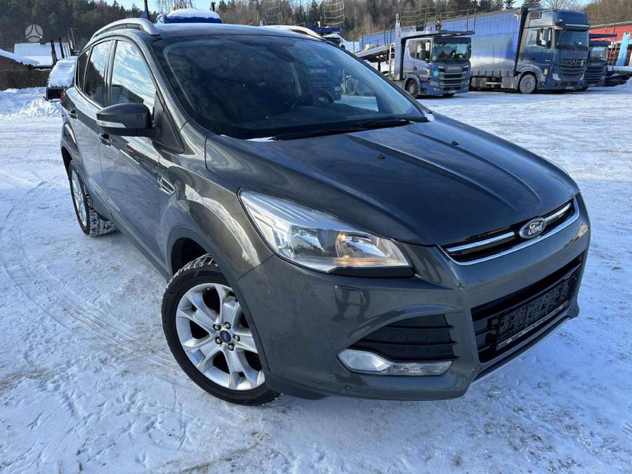 Green Ford Kuga 2014 in Prienai, with an engine capacity of 2.00 L and mileage of 253 thousand km for 7400 €, photo 1 on AUTOMOTO.COM.LV