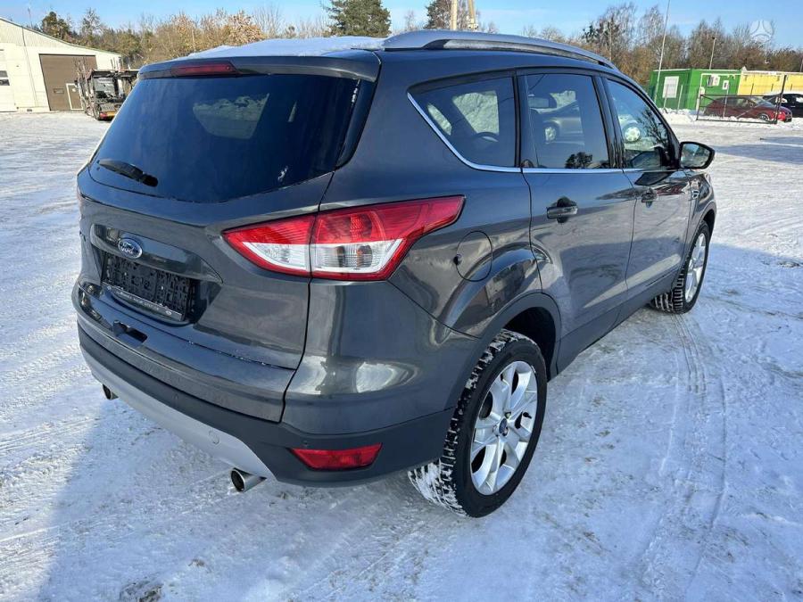 Green Ford Kuga 2014 in Prienai, with an engine capacity of 2.00 L and mileage of 253 thousand km for 7400 €, photo 7 on AUTOMOTO.COM.LV