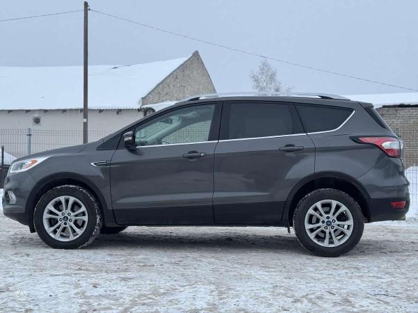 Green Ford Kuga 2017 in Taurage, with an engine capacity of 2.00 L and mileage of 290 thousand km for 8950 €, photo 7 on AUTOMOTO.COM.LV