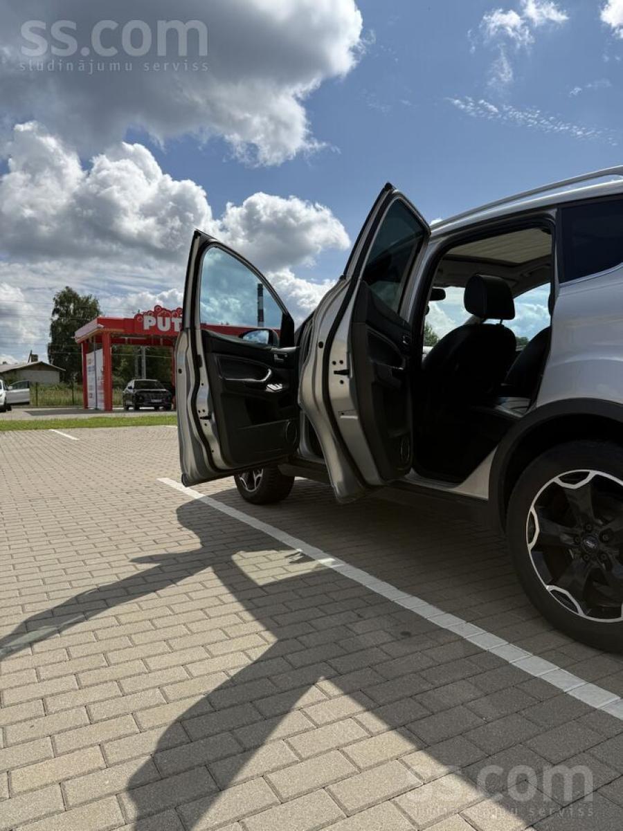 Grey Ford Kuga 2008 in Riga, with an engine capacity of 2.00 L and mileage of 245 thousand km for 5600 €, photo 15 on AUTOMOTO.COM.LV
