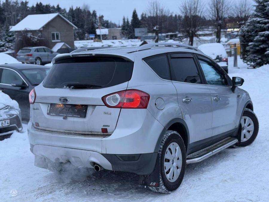 Grey Ford Kuga 2009 in Utena, with an engine capacity of 2.00 L and mileage of 250 thousand km for 3390 €, photo 2 on AUTOMOTO.COM.LV