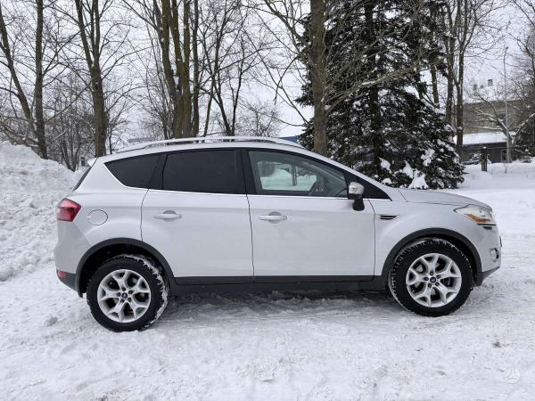 Grey Ford Kuga 2009 in Siauliai, with an engine capacity of 2.00 L and mileage of 205 thousand km for 3900 €, photo 7 on AUTOMOTO.COM.LV