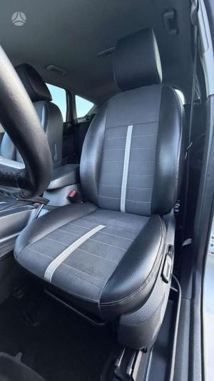 Grey Ford Kuga 2009 in Siauliai, with an engine capacity of 2.00 L and mileage of 269 thousand km for 6999 €, photo 15 on AUTOMOTO.COM.LV