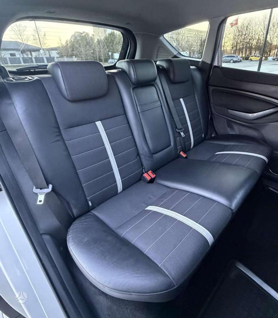 Grey Ford Kuga 2009 in Siauliai, with an engine capacity of 2.00 L and mileage of 269 thousand km for 6999 €, photo 21 on AUTOMOTO.COM.LV