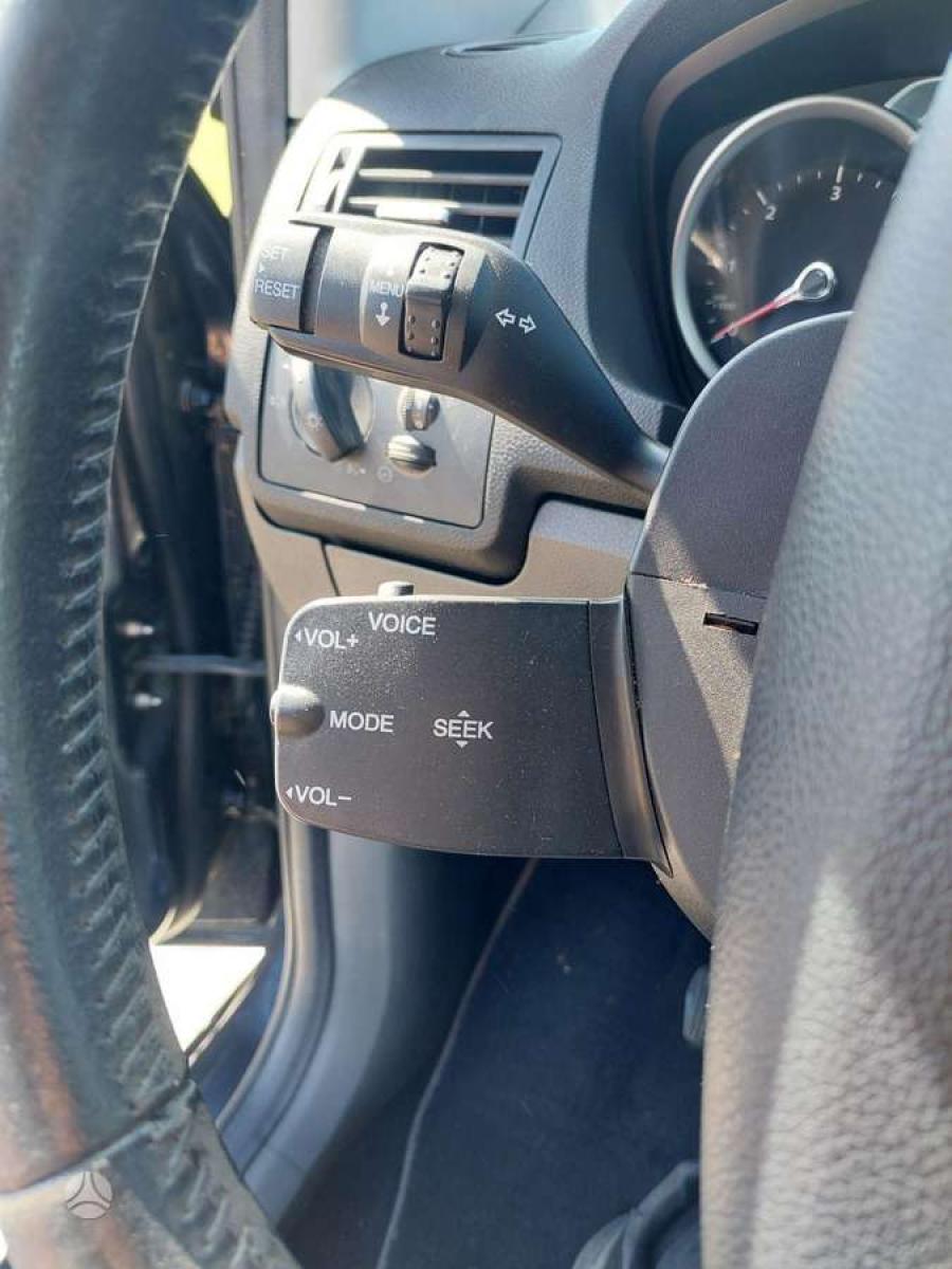 Grey Ford Kuga 2009 in Radviliskis, with an engine capacity of 2.00 L and mileage of 254 thousand km for 4499 €, photo 13 on AUTOMOTO.COM.LV