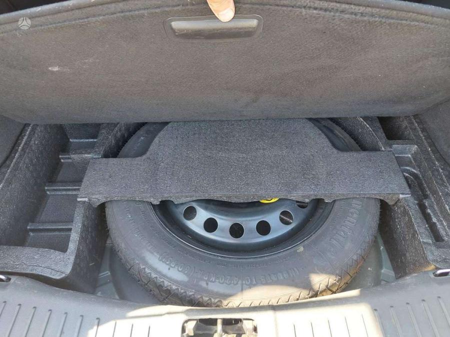 Grey Ford Kuga 2009 in Radviliskis, with an engine capacity of 2.00 L and mileage of 254 thousand km for 4499 €, photo 18 on AUTOMOTO.COM.LV