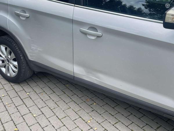 Pelēks Ford Kuga 2009 Panevēža, ar dzinēja tilpumu 2.00 L un nobraukumu 209 tūkst. km par 3250 €, foto 5 vietnē AUTOMOTO.COM.LV