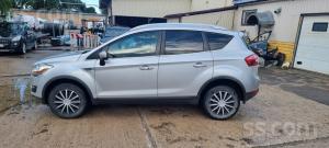 Grey Ford Kuga 2011 in Riga, with an engine capacity of 2.00 L and mileage of 259 thousand km for 5000 €, photo 8 on AUTOMOTO.COM.LV