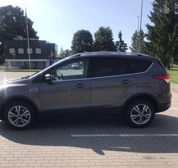 Grey Ford Kuga 2013 in Taurage, with an engine capacity of 2.00 L and mileage of 284 thousand km for 5300 €, photo 4 on AUTOMOTO.COM.LV