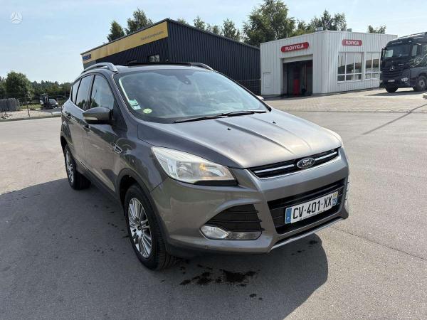Grey Ford Kuga 2013 in Taurage, with an engine capacity of 2.00 L and mileage of 236 thousand km for 5900 €, photo 2 on AUTOMOTO.COM.LV