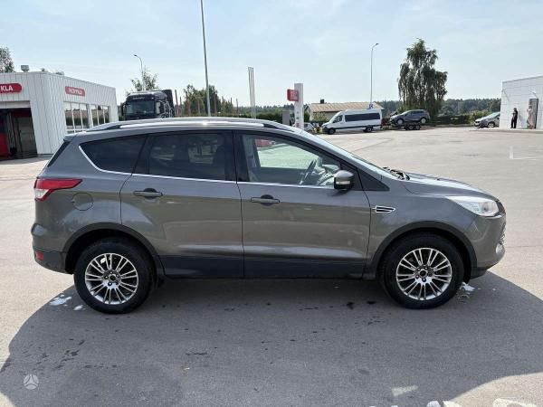 Grey Ford Kuga 2013 in Taurage, with an engine capacity of 2.00 L and mileage of 236 thousand km for 5900 €, photo 3 on AUTOMOTO.COM.LV