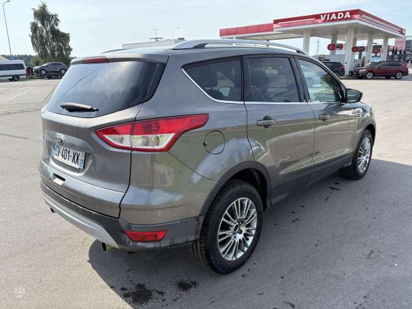 Grey Ford Kuga 2013 in Taurage, with an engine capacity of 2.00 L and mileage of 236 thousand km for 5900 €, photo 4 on AUTOMOTO.COM.LV
