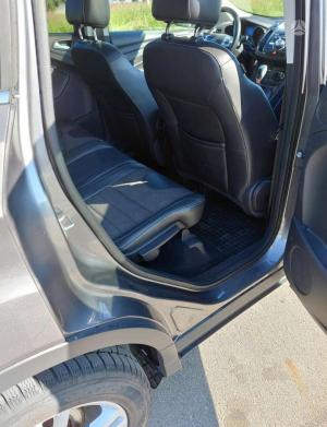 Grey Ford Kuga 2013 in Klaipeda, with an engine capacity of 2.00 L and mileage of 284 thousand km for 5850 €, photo 9 on AUTOMOTO.COM.LV