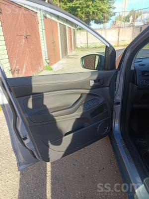 Pelēks Ford Kuga 2013 Rīga, ar dzinēja tilpumu 2.00 L un nobraukumu 196 tūkst. km par 6000 €, foto 21 vietnē AUTOMOTO.COM.LV
