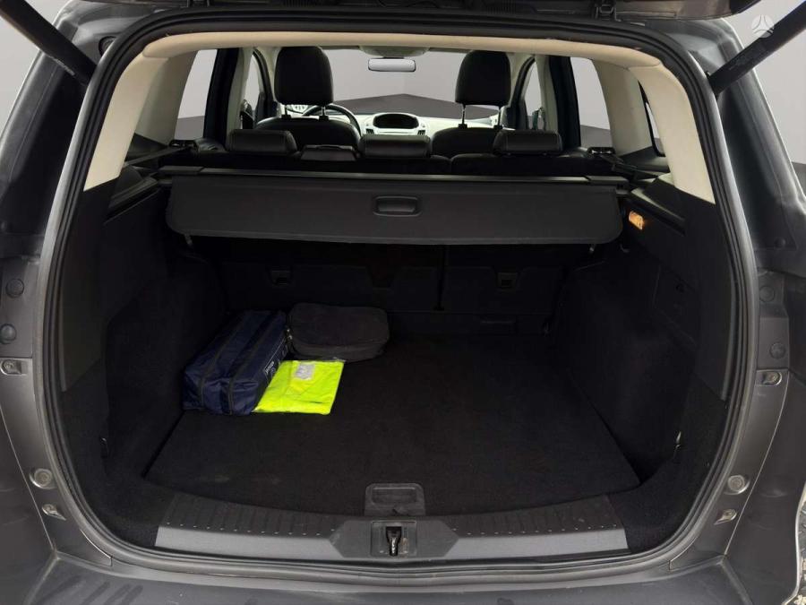 Grey Ford Kuga 2013 in Kaunas, with an engine capacity of 2.00 L and mileage of 202 thousand km for 7699 €, photo 12 on AUTOMOTO.COM.LV