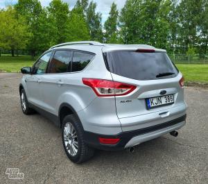 Grey Ford Kuga 2014 in Siauliai, with an engine capacity of 2.00 L and mileage of 300 thousand km for 6350 €, photo 7 on AUTOMOTO.COM.LV