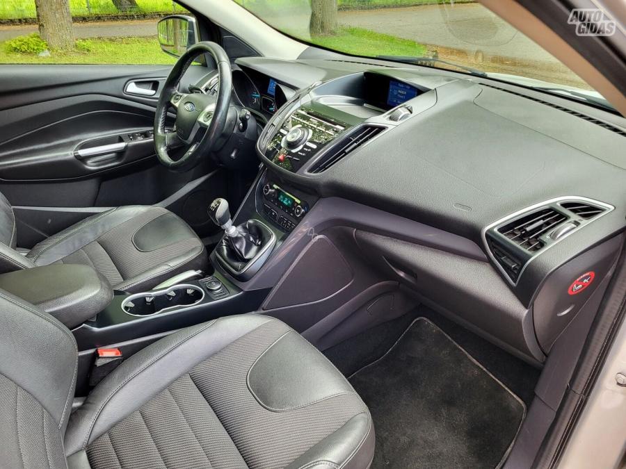 Grey Ford Kuga 2014 in Siauliai, with an engine capacity of 2.00 L and mileage of 300 thousand km for 6350 €, photo 9 on AUTOMOTO.COM.LV