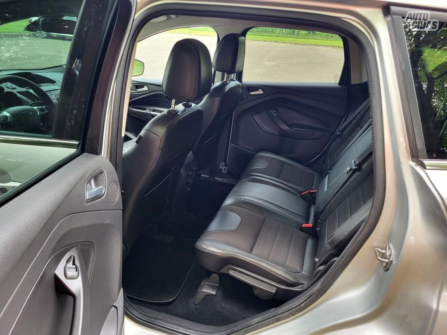 Grey Ford Kuga 2014 in Siauliai, with an engine capacity of 2.00 L and mileage of 300 thousand km for 6350 €, photo 12 on AUTOMOTO.COM.LV