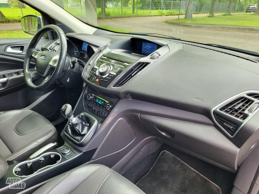 Grey Ford Kuga 2014 in Siauliai, with an engine capacity of 2.00 L and mileage of 300 thousand km for 6350 €, photo 22 on AUTOMOTO.COM.LV