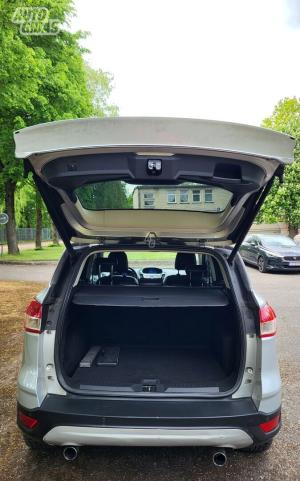 Grey Ford Kuga 2014 in Siauliai, with an engine capacity of 2.00 L and mileage of 300 thousand km for 6350 €, photo 24 on AUTOMOTO.COM.LV