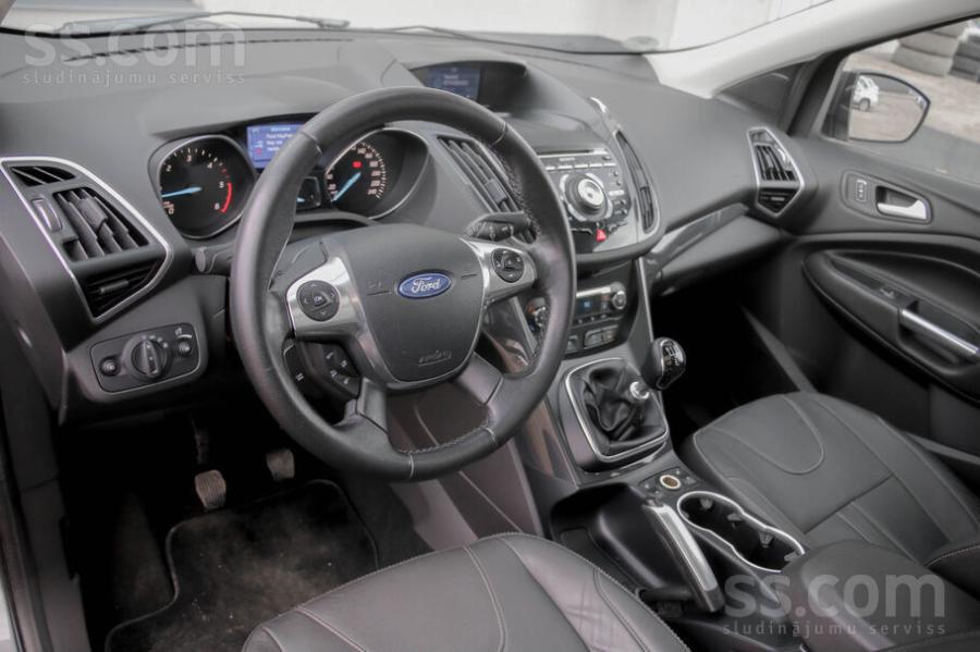 Grey Ford Kuga 2014 in Tukums, with an engine capacity of 2.00 L and mileage of 217 thousand km for 9480 €, photo 15 on AUTOMOTO.COM.LV