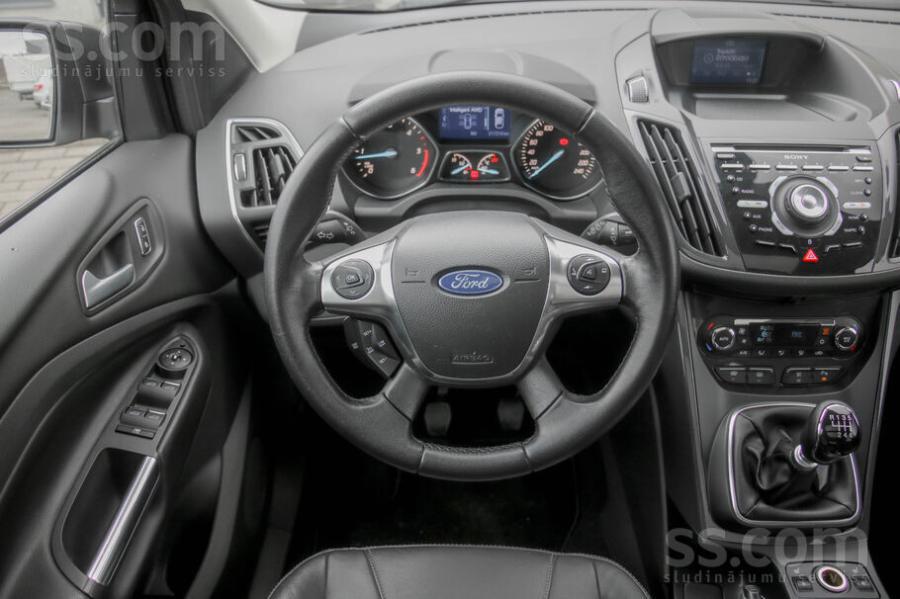 Grey Ford Kuga 2014 in Tukums, with an engine capacity of 2.00 L and mileage of 217 thousand km for 9480 €, photo 16 on AUTOMOTO.COM.LV
