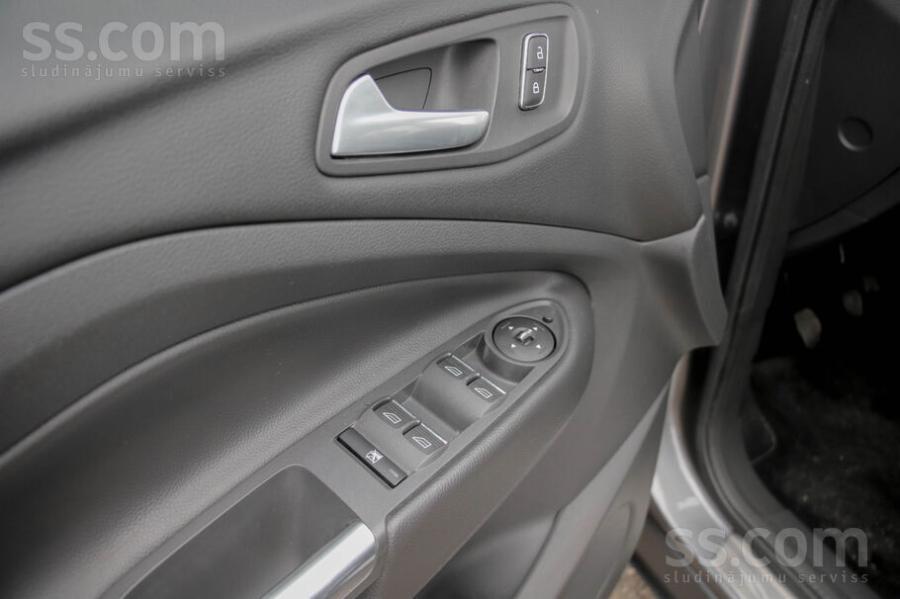 Grey Ford Kuga 2014 in Tukums, with an engine capacity of 2.00 L and mileage of 217 thousand km for 9480 €, photo 28 on AUTOMOTO.COM.LV