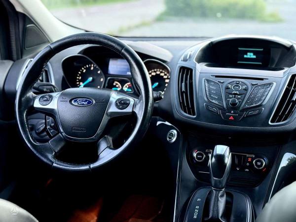 Grey Ford Kuga 2014 in Kaunas, with an engine capacity of 2.00 L and mileage of 218 thousand km for 6800 €, photo 8 on AUTOMOTO.COM.LV