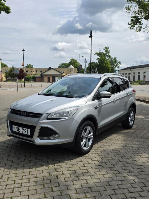 Grey Ford Kuga 2014 in Mazeikiai, with an engine capacity of 2.00 L and mileage of 212 thousand km for 7000 €, photo 3 on AUTOMOTO.COM.LV