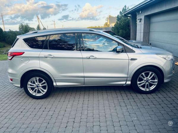 Ford Kuga 2014 in Marijampole on AUTOMOTO.COM.LV Grey Ford Kuga 2014 in Marijampole, with an engine capacity of 2.00 L and mileage of 255 thousand km for 6700 €, photo 8 on AUTOMOTO.COM.LV