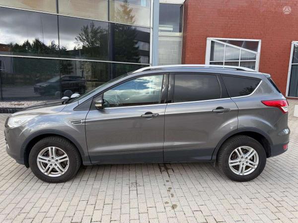 Ford Kuga 2014 in Marijampole on AUTOMOTO.COM.LV Grey Ford Kuga 2014 in Marijampole, with an engine capacity of 2.00 L and mileage of 157 thousand km for 7900 €, photo 5 on AUTOMOTO.COM.LV