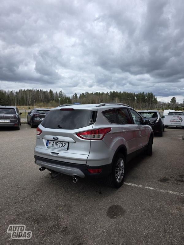 Grey Ford Kuga 2015 in Vilnius, with an engine capacity of 2.00 L and mileage of 217 thousand km for 6200 €, photo 2 on AUTOMOTO.COM.LV
