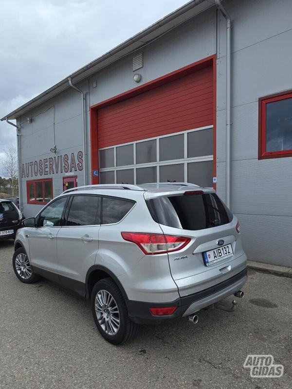 Grey Ford Kuga 2015 in Vilnius, with an engine capacity of 2.00 L and mileage of 217 thousand km for 6200 €, photo 5 on AUTOMOTO.COM.LV