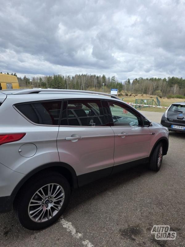 Grey Ford Kuga 2015 in Vilnius, with an engine capacity of 2.00 L and mileage of 217 thousand km for 6200 €, photo 7 on AUTOMOTO.COM.LV