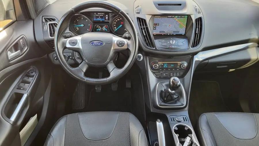 Grey Ford Kuga 2015 in Riga, with an engine capacity of 2.00 L and mileage of 270 thousand km for 7700 €, photo 3 on AUTOMOTO.COM.LV