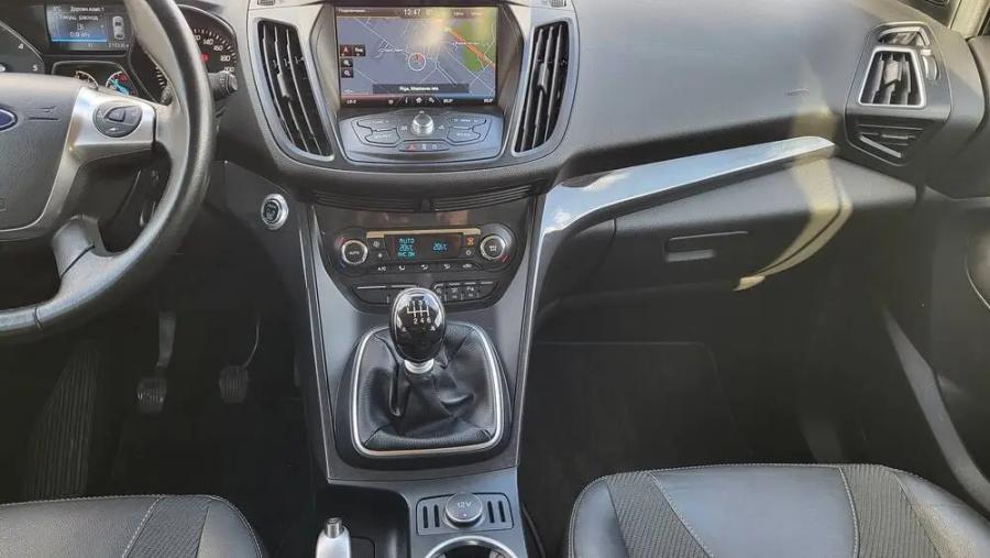Grey Ford Kuga 2015 in Riga, with an engine capacity of 2.00 L and mileage of 270 thousand km for 7700 €, photo 7 on AUTOMOTO.COM.LV