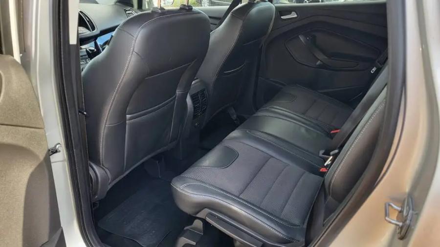 Grey Ford Kuga 2015 in Riga, with an engine capacity of 2.00 L and mileage of 270 thousand km for 7700 €, photo 11 on AUTOMOTO.COM.LV