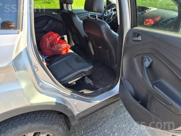 Grey Ford Kuga 2015 in Riga, with an engine capacity of 2.00 L and mileage of 192 thousand km for 6300 €, photo 4 on AUTOMOTO.COM.LV