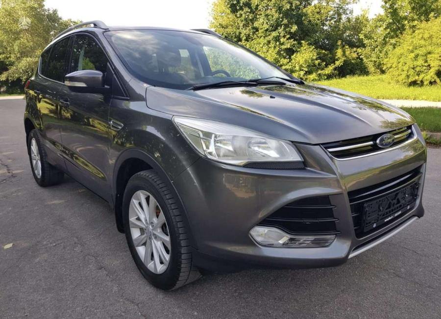 Grey Ford Kuga 2016 in Siauliai, with an engine capacity of 2.00 L and mileage of 235 thousand km for 7200 €, photo 4 on AUTOMOTO.COM.LV