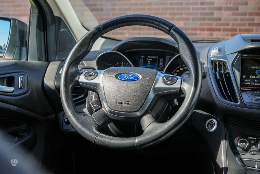 Grey Ford Kuga 2016 in Marijampole, with an engine capacity of 2.00 L and mileage of 236 thousand km for 7750 €, photo 15 on AUTOMOTO.COM.LV