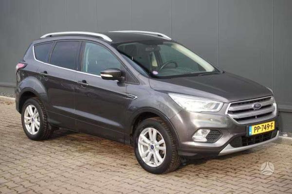 Pelēks Ford Kuga 2017 Klaipėda, ar dzinēja tilpumu 1.50 L un nobraukumu 129 tūkst. km par 9800 €, foto 1 vietnē AUTOMOTO.COM.LV
